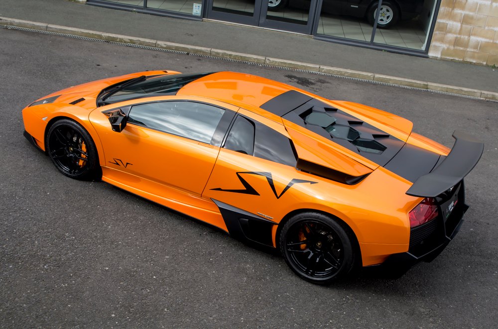 Photographer crashes Lamborghini into dealership window – Car Dealer ...