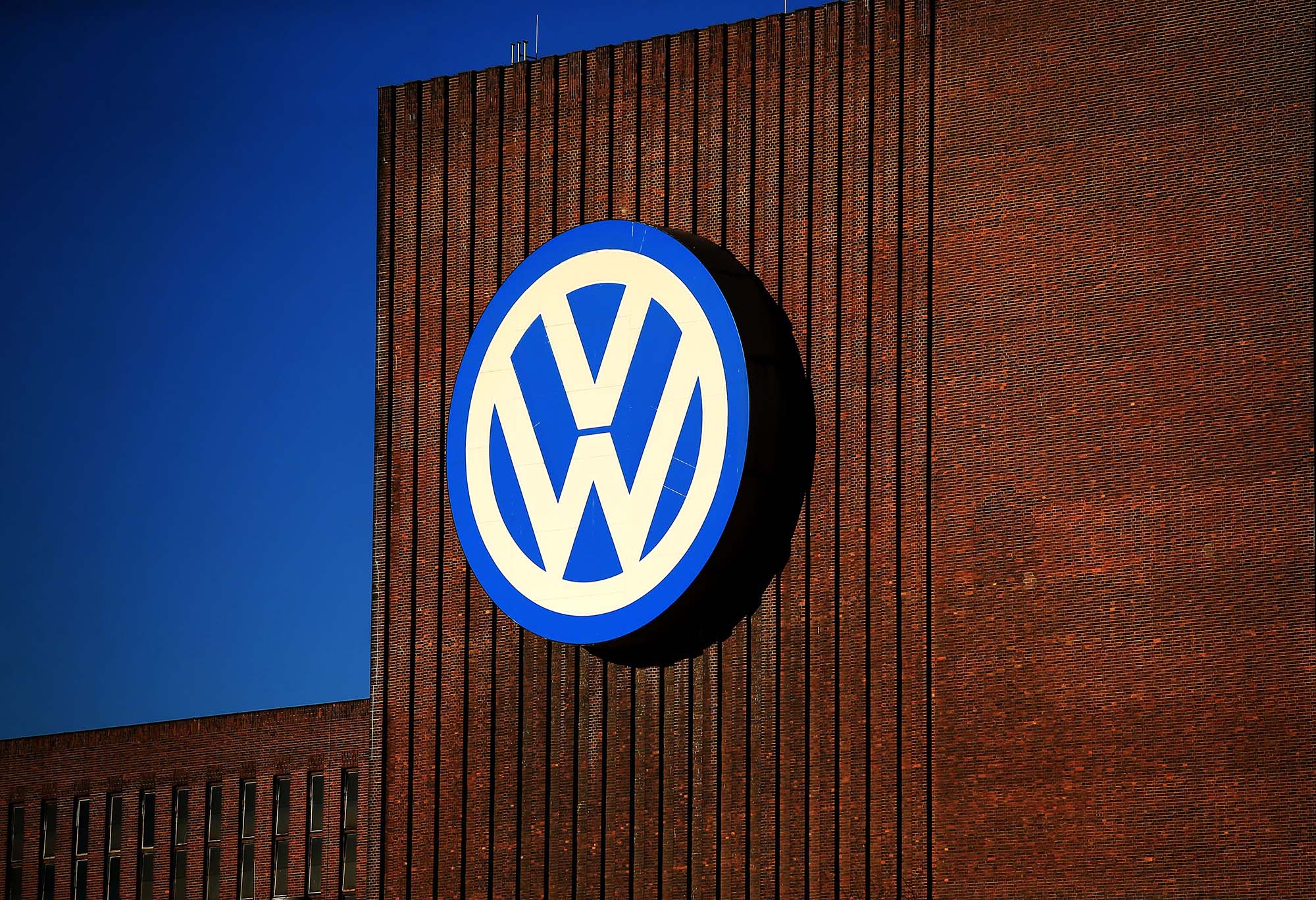 VW staff switch off heating and lights after eco protesters glue ...