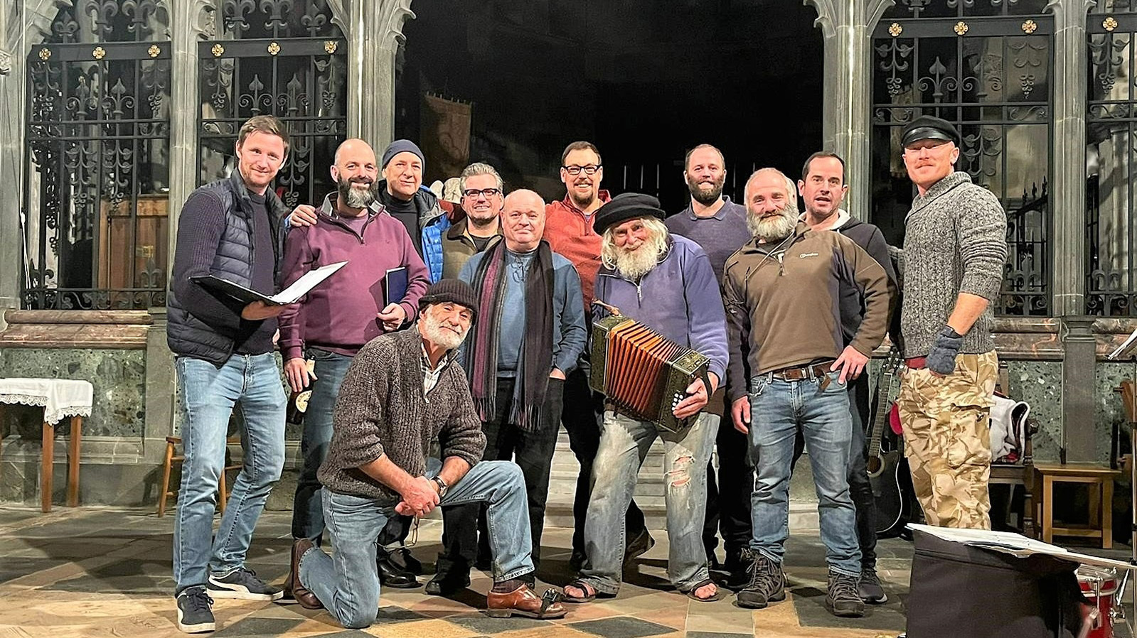 Car dealership director helps raise money for RNLI with festive shanty ...