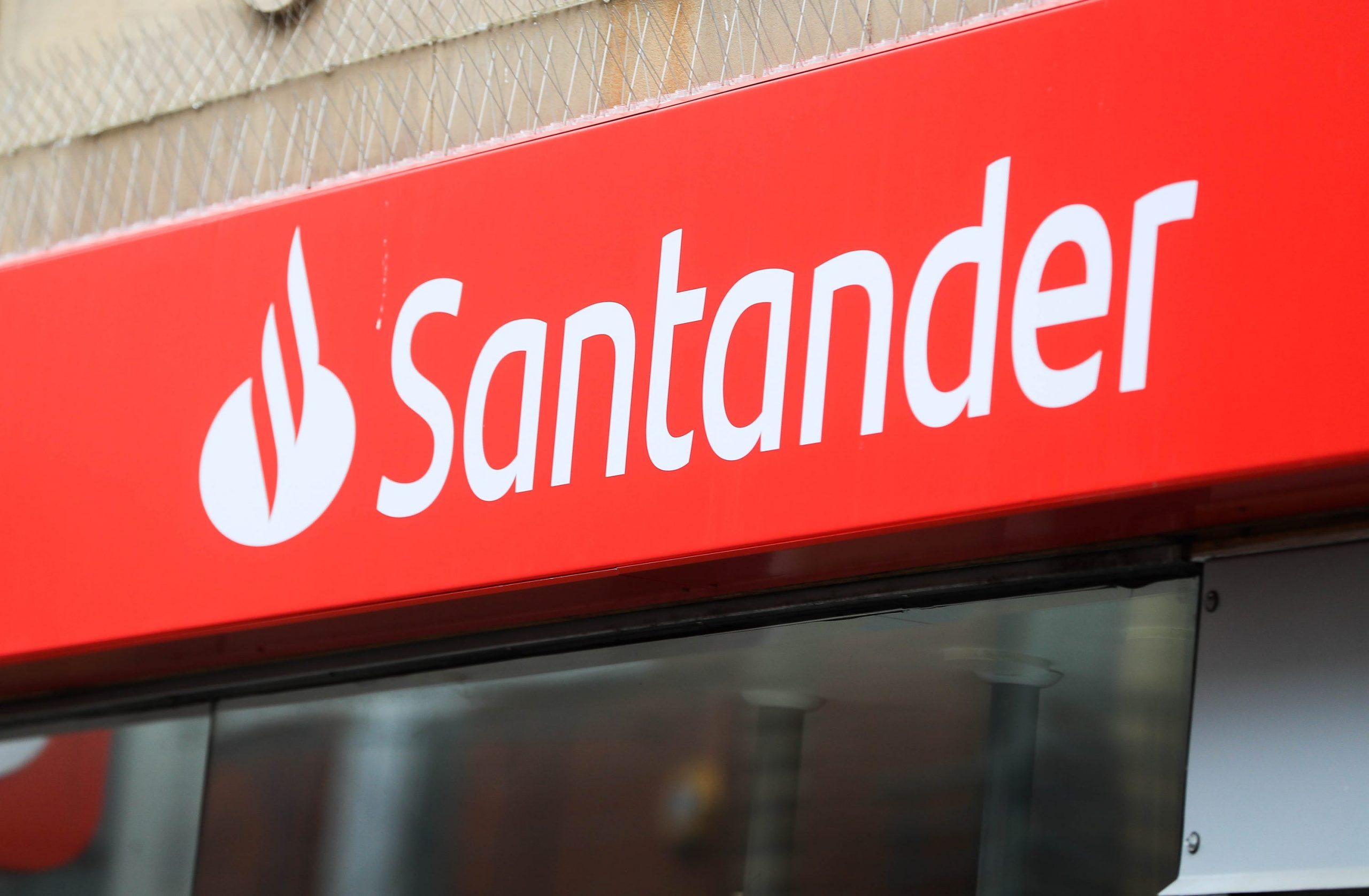 Santander puts aside £295m to deal with motor finance crisis as FCA ...