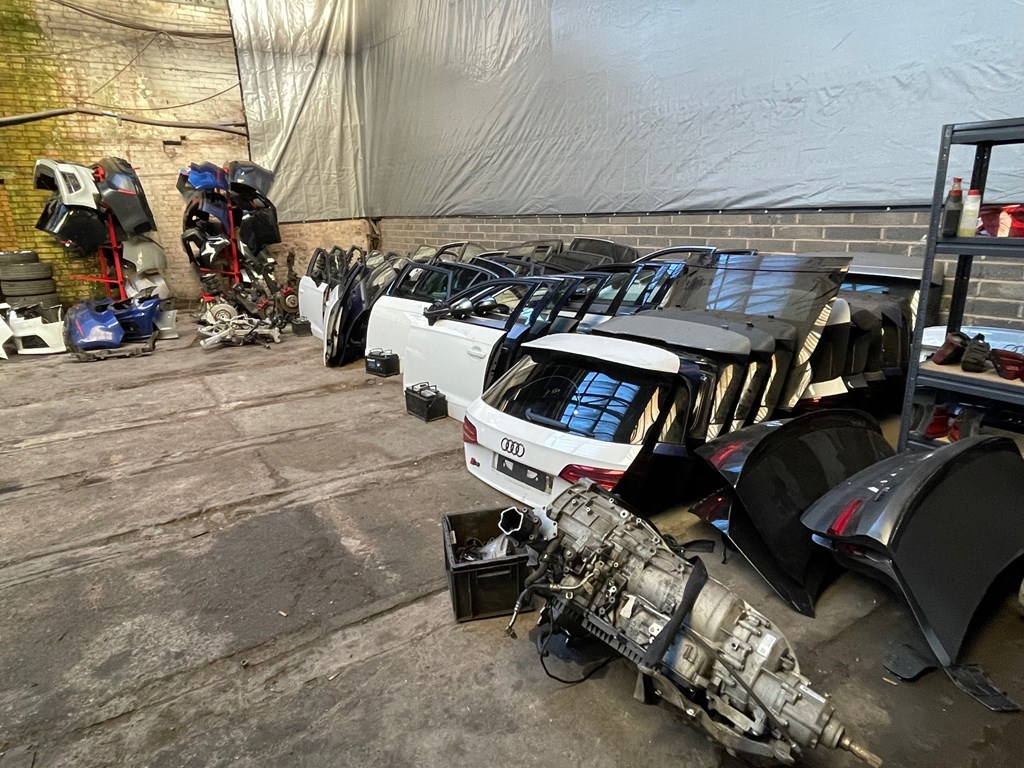 Police make two arrests as officers carry out raid on major chop shop ...
